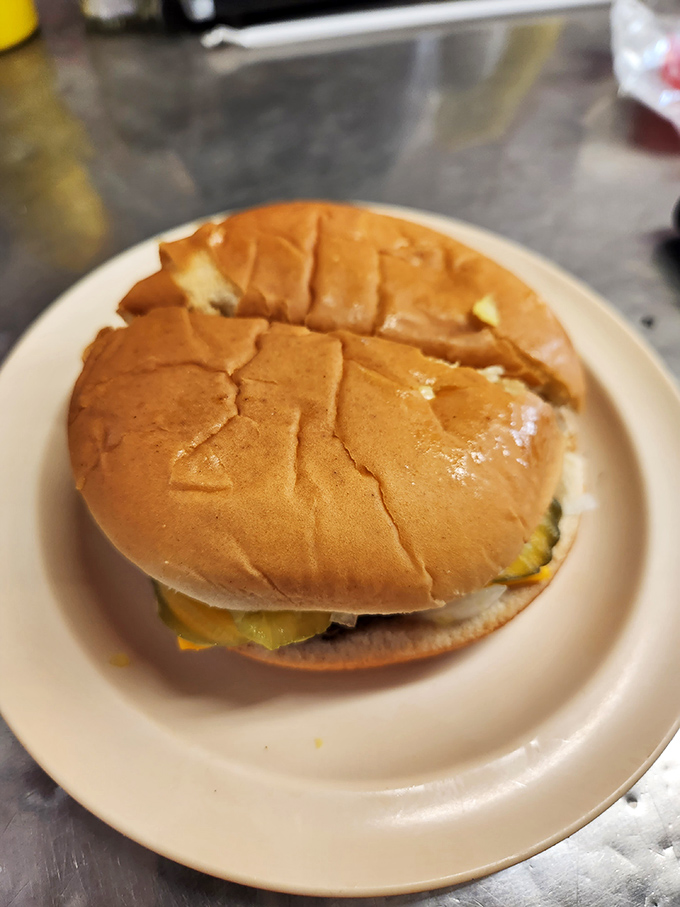 This isn't just a cheeseburger; it's a time machine on a plate that takes you back to when food was honest and satisfaction guaranteed.
