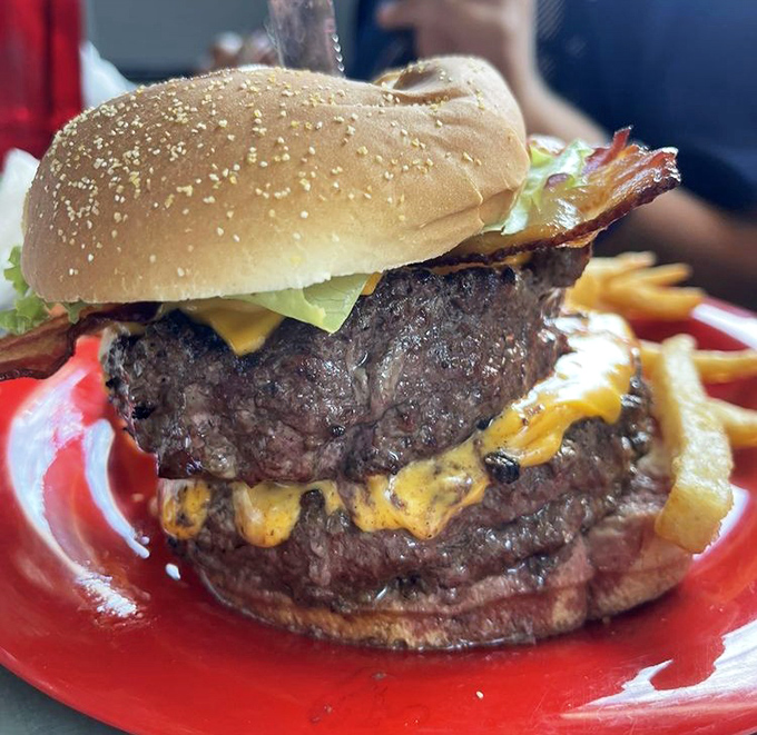 This towering burger with melted cheese and bacon is what happens when a seafood joint decides to show off its land-based skills.