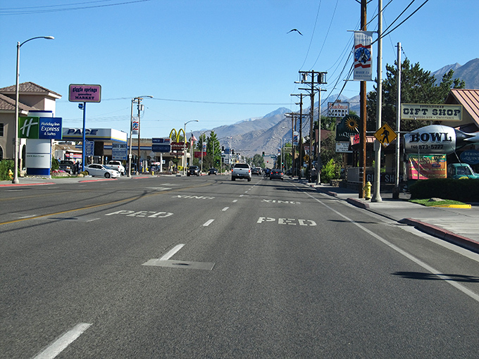 Downtown Bishop stretches toward the mountains like a postcard come to life, where even the stop signs seem to say "slow down and enjoy the view."