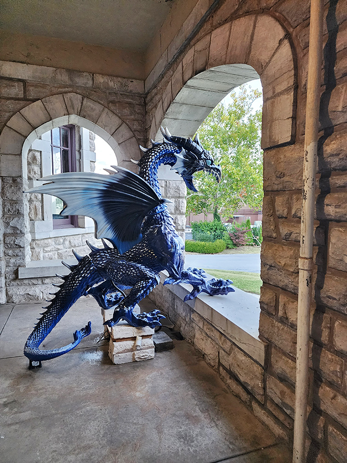 This brilliant blue dragon statue adds a pop of fantasy to the castle's stone archways, as if guarding treasures from would-be knights. 