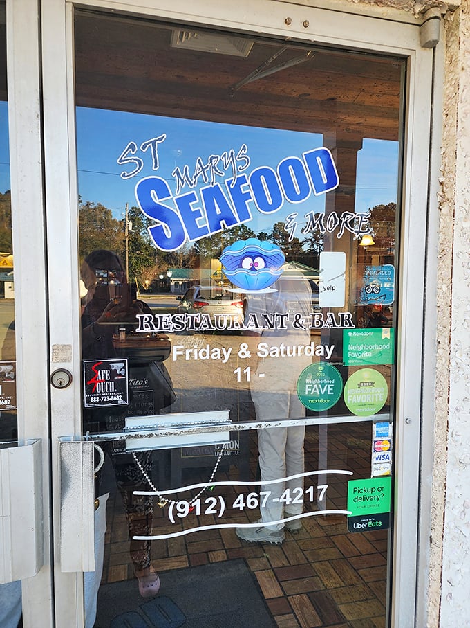 The front door promises seafood treasures within. That cartoon oyster mascot has the look of someone who knows exactly how good the food is.
