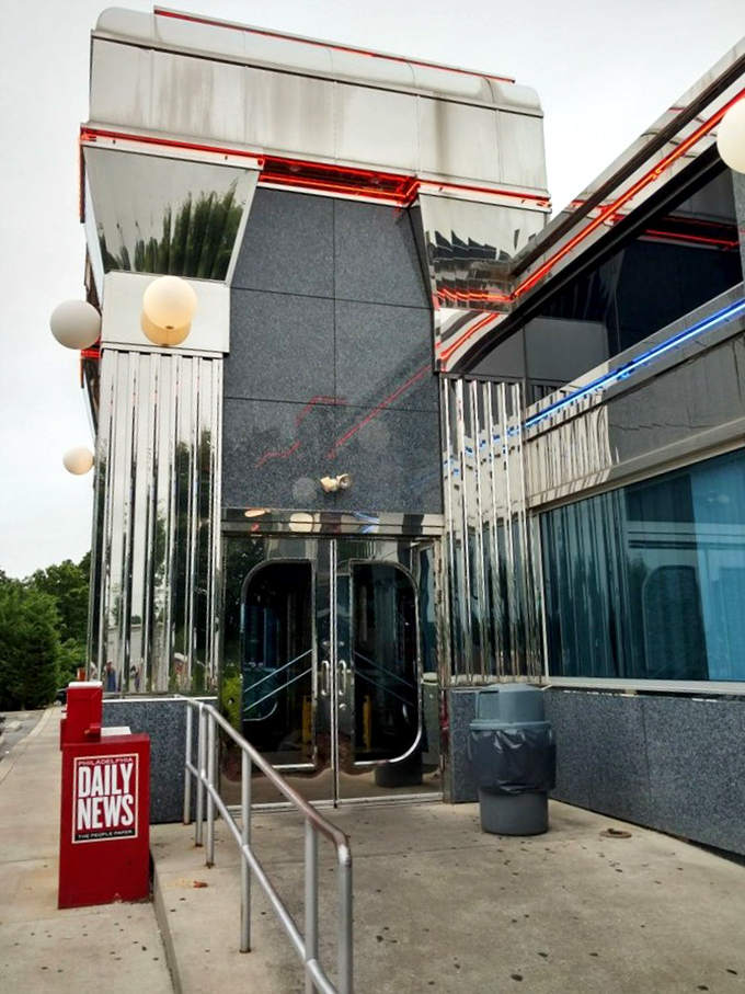 The gleaming entrance stands like a portal to comfort food paradise—step through these doors and leave your diet at home.