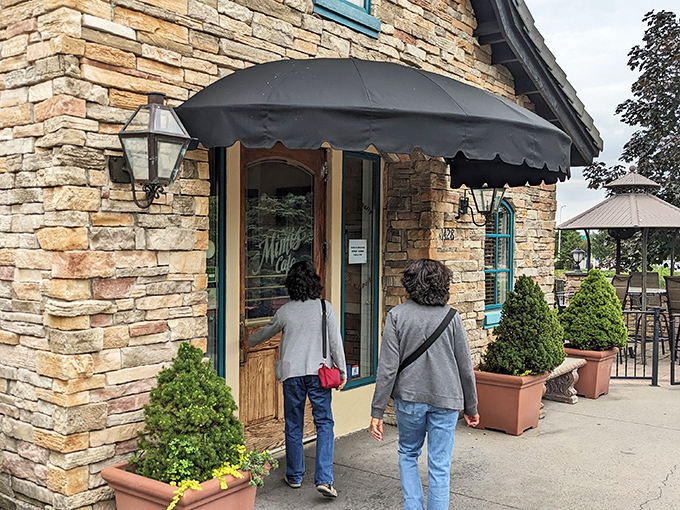 The moment of anticipation before a great meal begins. That stone entrance isn't just an architectural choice—it's a portal to carbohydrate happiness.