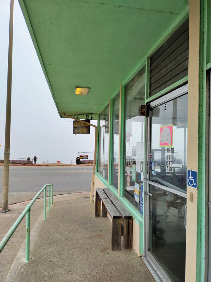 Fog-kissed entrance with the Pacific Ocean as its neighbor – even on gray days, this doorway promises culinary sunshine waiting just inside.