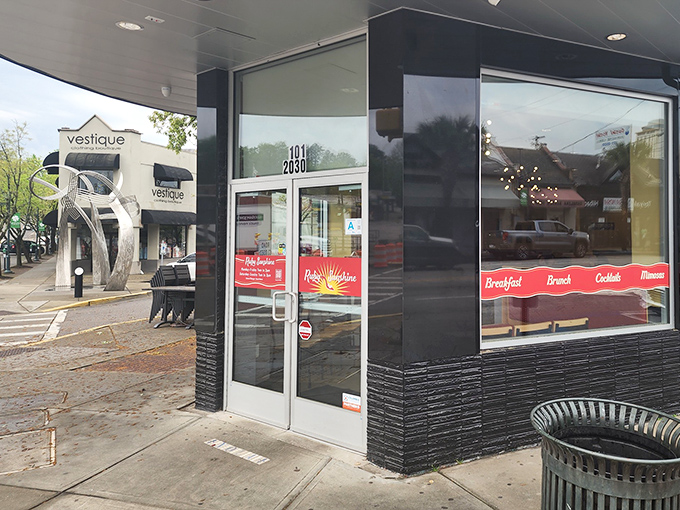 The entrance promises what awaits inside: a modern take on breakfast classics that respects tradition while embracing innovation.