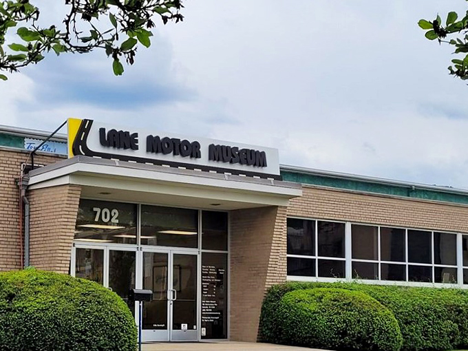 The unassuming exterior of Lane Motor Museum gives no hint of the mechanical marvels within—like finding a Ferrari engine in a minivan.