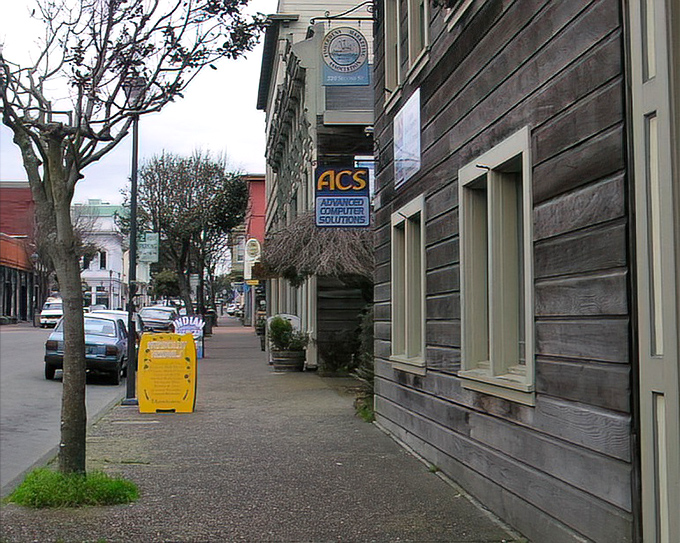 F Street's weathered wooden buildings tell stories of Eureka's past while housing its present. This is what authentic character looks like&mdash;you can't manufacture this kind of charm.