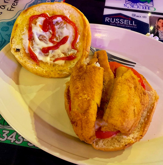 A fish sandwich with personality, complete with a ketchup smiley face that says, "You're about to have a really good time."