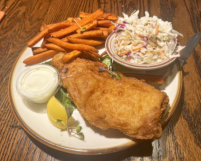 Fish and chips that would make the British jealous. Golden, crispy, and served with the kind of fries that disappear mysteriously fast.