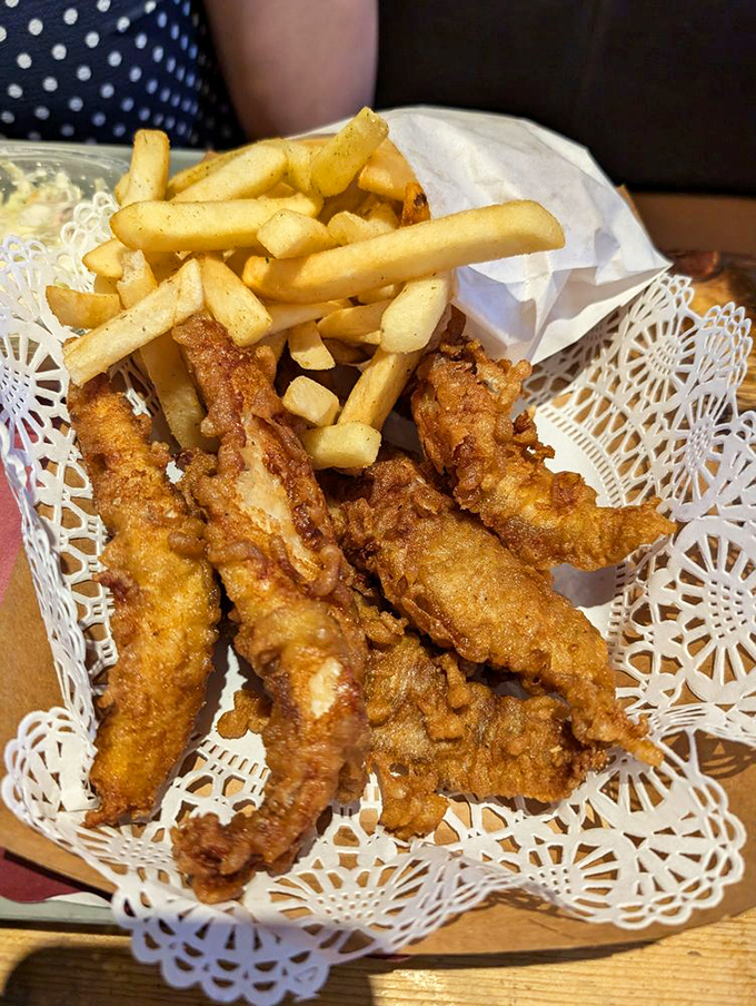 More golden treasures nestled in their paper basket&mdash;proof that sometimes the simplest pleasures are the most profound.