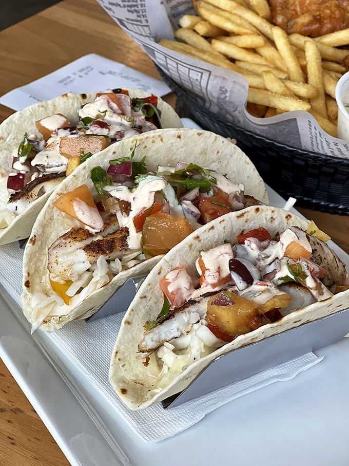 These fish tacos bring coastal vacation vibes to Pennsylvania with fresh toppings and a drizzle of sauce that ties everything together like a well-written conclusion.