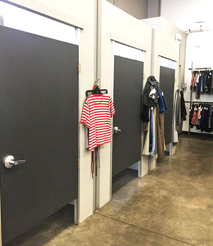 The fitting room corridor&mdash;that moment of truth where thrift store optimism meets reality, and sometimes, surprisingly perfect matches are made.