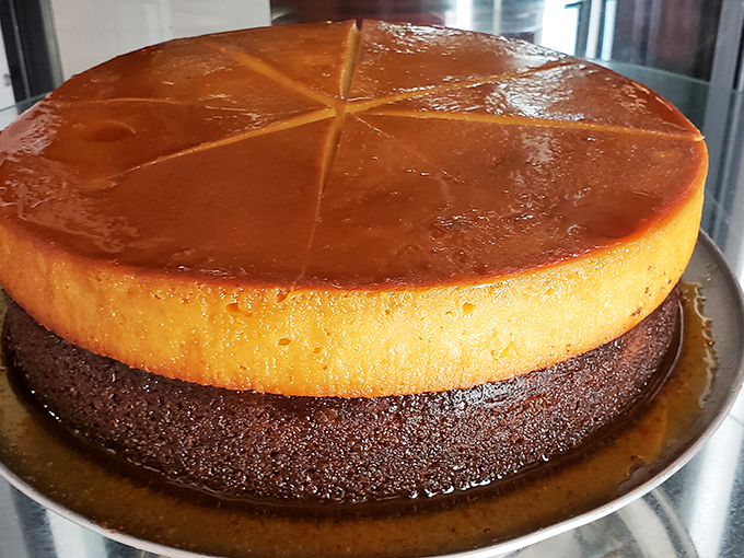 Flan cake gleaming like burnished gold &ndash; half custard dream, half chocolate fantasy &ndash; waiting to transform ordinary days into celebrations. 