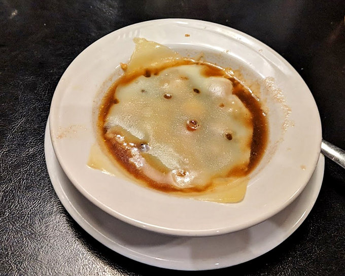 French onion soup under a blanket of melted cheese&mdash;the culinary equivalent of a warm embrace on a cold Missouri evening.