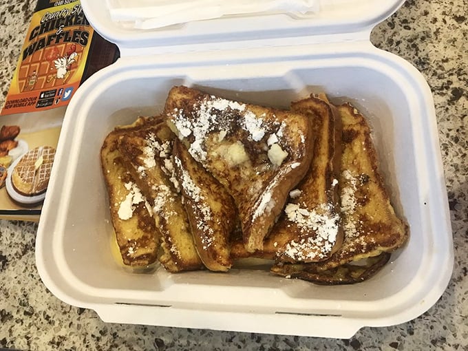 French toast that makes you question why you ever settled for lesser breakfasts. Powdered sugar dusting like the first perfect snowfall.