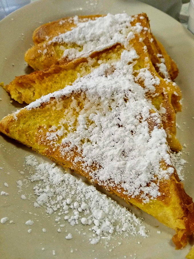 French toast dusted with powdered sugar like a gentle Ohio snowfall&mdash;sweet, comforting, and guaranteed to make Monday feel like Saturday.