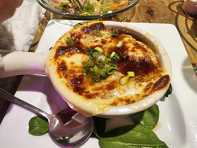 French onion soup that doesn't just warm your stomach&mdash;it hugs your soul. That melted cheese cap is the culinary equivalent of a cozy blanket.