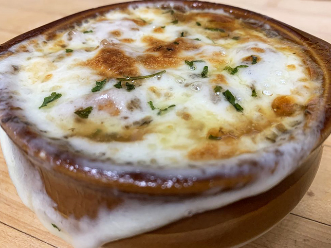 French onion soup: the ultimate comfort food litmus test. That cheese pull, those caramelized onions, and a broth so rich it could buy a small country.