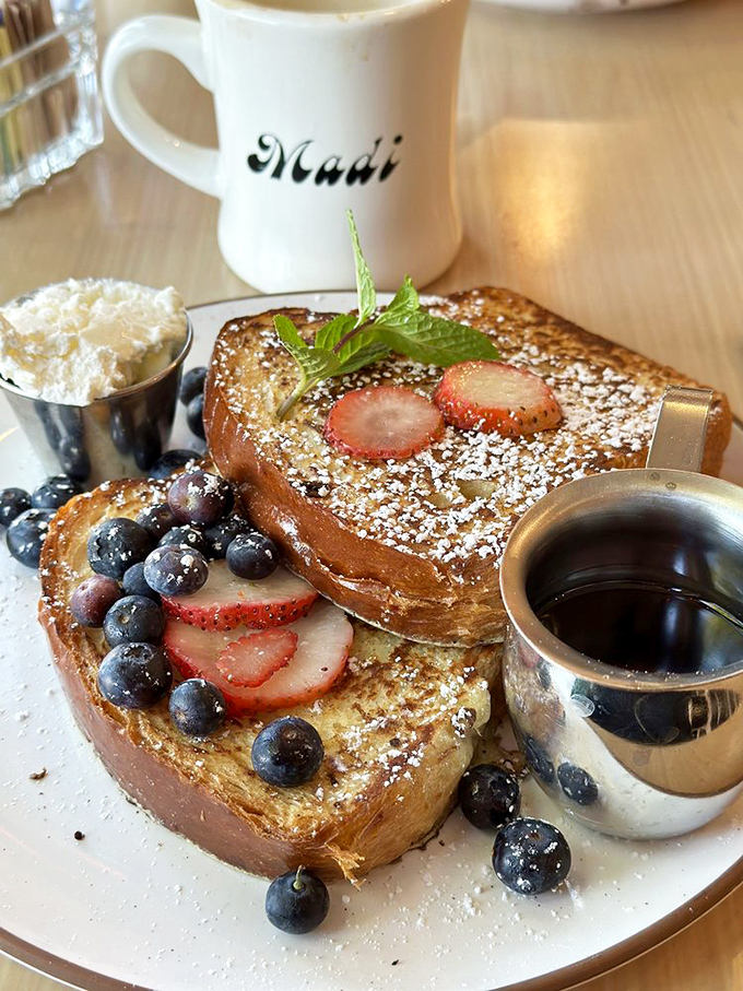 French toast that makes ordinary bread feel inadequate. Those berries aren't garnish&mdash;they're jewels in a breakfast crown.