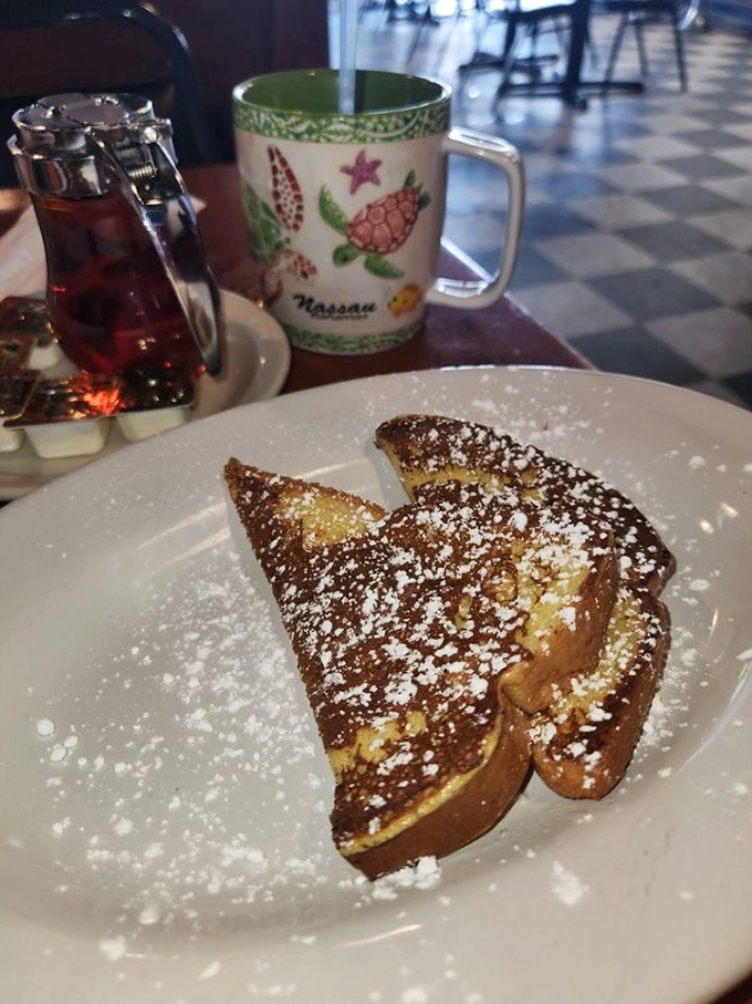 French toast so golden and perfect, it practically glows with buttery, syrupy breakfast magic.