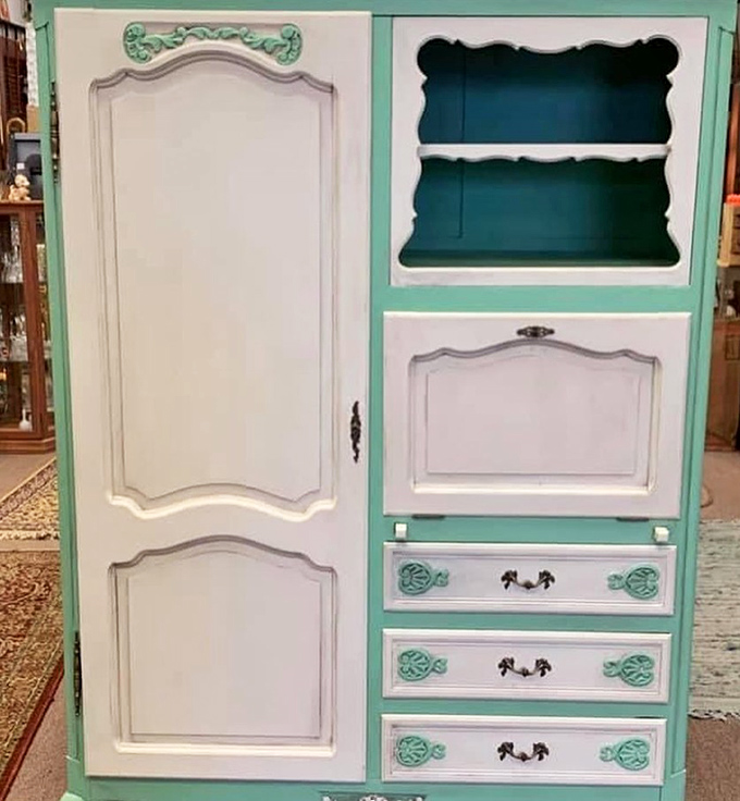This mint-and-white wardrobe doesn't just store clothes &ndash; it's practically the gateway to Narnia for vintage furniture enthusiasts with imagination and space to spare. 