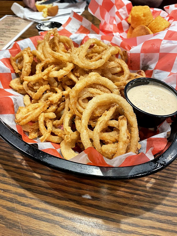 Onion straws so perfectly fried, they make you wonder why onions ever bother showing up in any other form. 