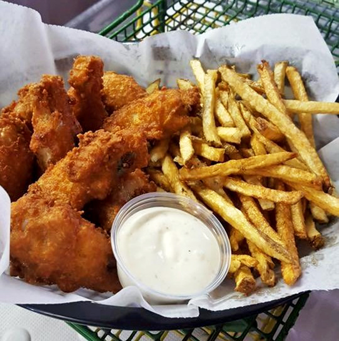 The fried basket arrives like a treasure chest of comfort&mdash;golden chicken, hand-cut fries, and house-made dipping sauce that makes fast food chains weep with inadequacy. 