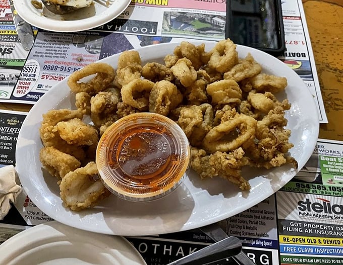 Fried calamari that ruins you for all other calamari. Crispy, tender, and completely devoid of that rubber-band texture that gives squid a bad name.