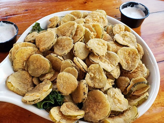 Fried pickle chips that could convert even pickle skeptics. Crunchy, tangy, and utterly addictive—the perfect sidekick to seafood.