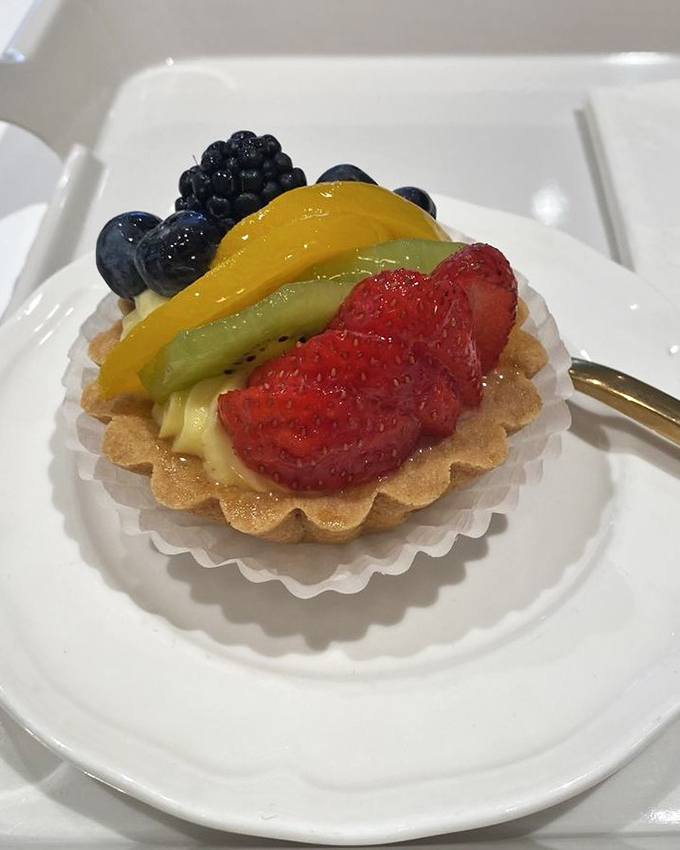 This fruit tart is jewelry for your taste buds—meticulously arranged berries atop custard so smooth it should be illegal in at least seven states.