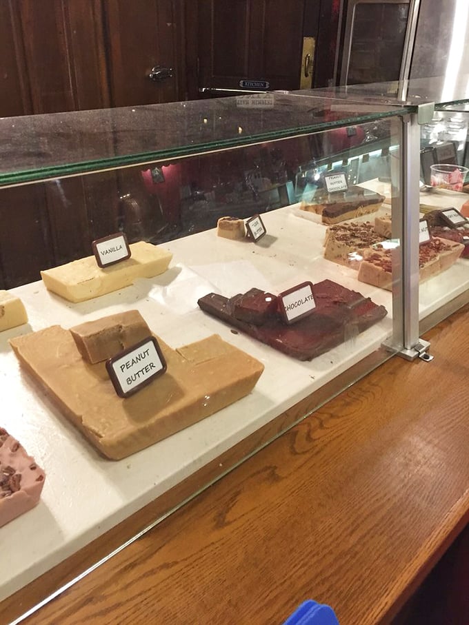 Homemade fudge displayed like the edible art it truly is – chocolate, vanilla, and peanut butter squares beckoning with sweet, creamy promises.