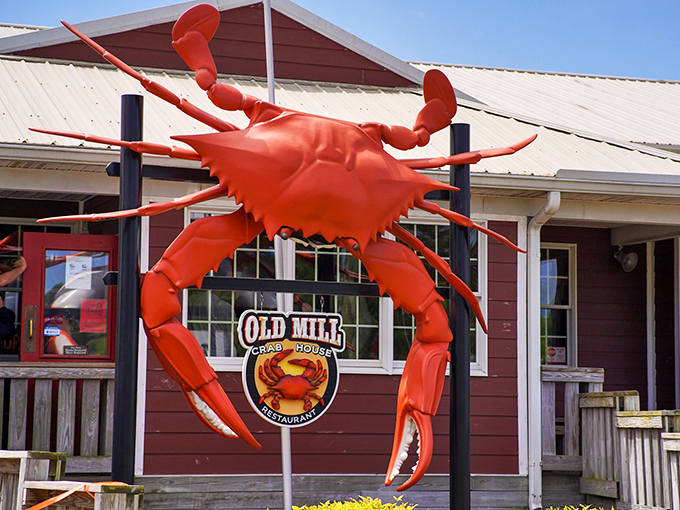 This giant red sentinel stands guard outside, a sculptural promise of the crabby delights that await within.