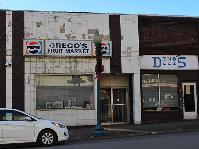 Behind Greco's weathered sign lies the kind of family market where produce doesn't need fancy lighting to look good—just honest freshness and local pride.