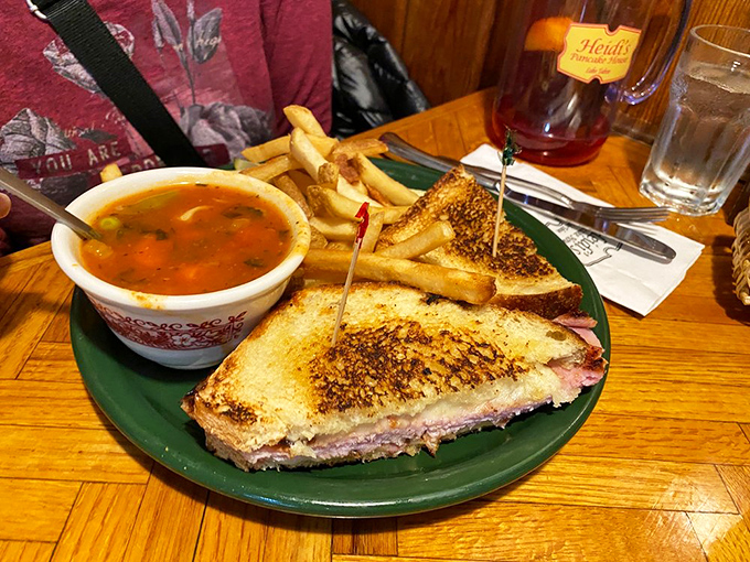 A grilled ham and cheese with soup&mdash;proof that Heidi's knows lunch deserves the same loving attention as their legendary breakfasts.