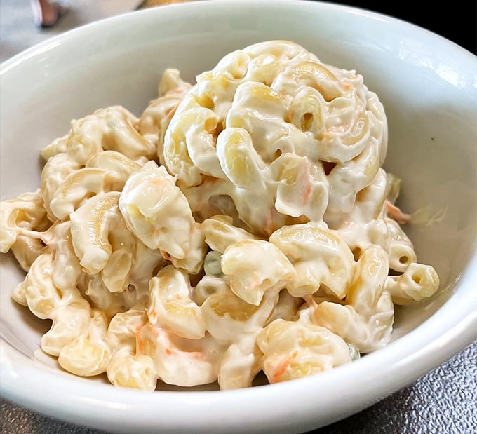Hawaiian mac salad that's creamier than your favorite bedtime story &ndash; the perfect side dish for pretending you're on island time.