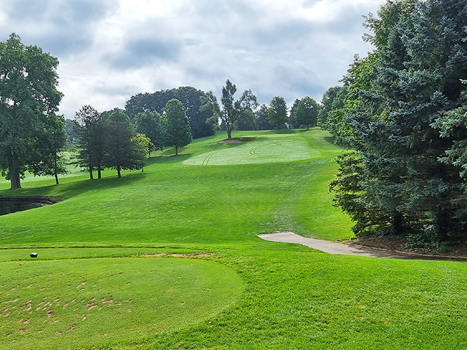 Rolling golf course fairways provide serene recreation opportunities that perfectly complement Brooklyn's racing excitement.
