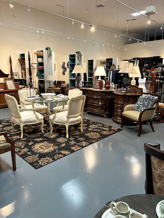 A furniture tableau so perfectly arranged you'll want to move in immediately. That glass-topped table has hosted countless imaginary dinner parties awaiting its forever home.