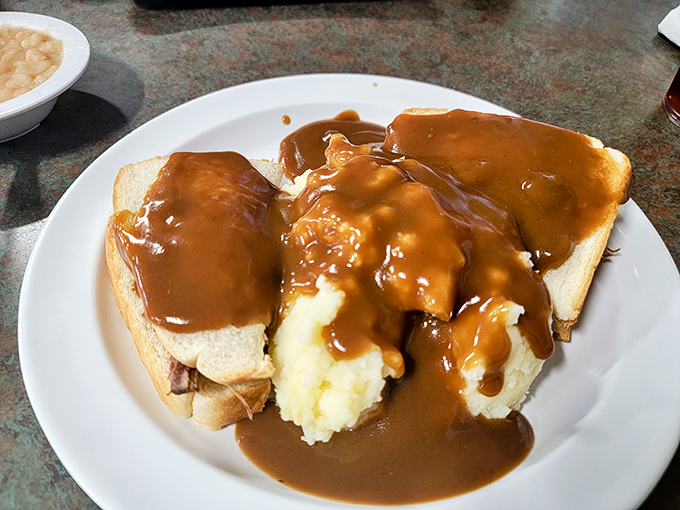 The hot roast beef sandwich&mdash;where gravy isn't just an addition, it's a flood of flavor covering a landscape of comfort.