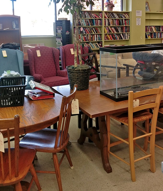 Dining sets and wingback chairs create impromptu living rooms throughout the store, inviting shoppers to imagine these pieces in their homes.