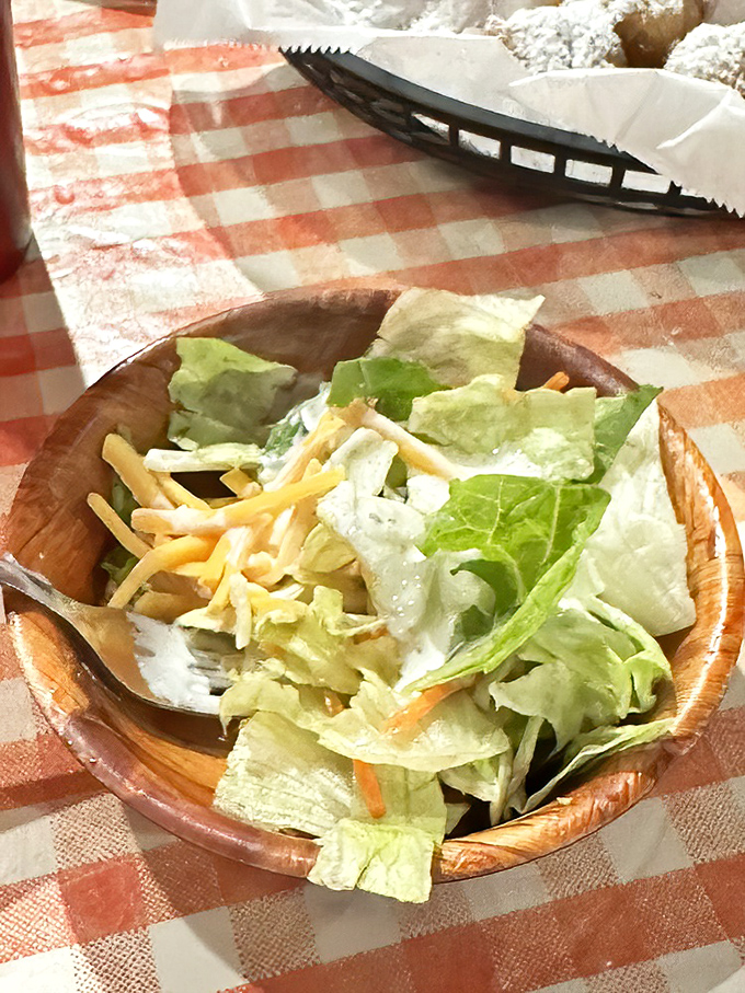 Even the house salad gets the homestyle treatment &ndash; fresh greens and shredded cheese in a wooden bowl that makes eating vegetables feel like an event.