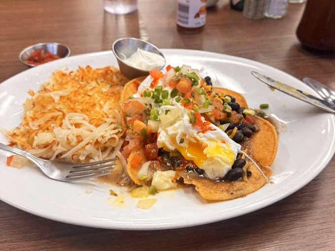 Huevos rancheros that bridge cultures and cure hangovers. That runny egg yolk is about to create a moment of pure breakfast bliss.