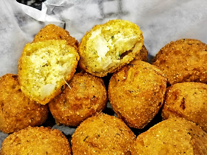 Hushpuppies with the perfect crisp-to-tender ratio&mdash;golden orbs of cornmeal joy that somehow manage to upstage even the seafood. 