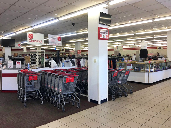 The checkout area stands ready with red carts and friendly cashiers&mdash;the final step in transforming someone's donations into another person's treasures.