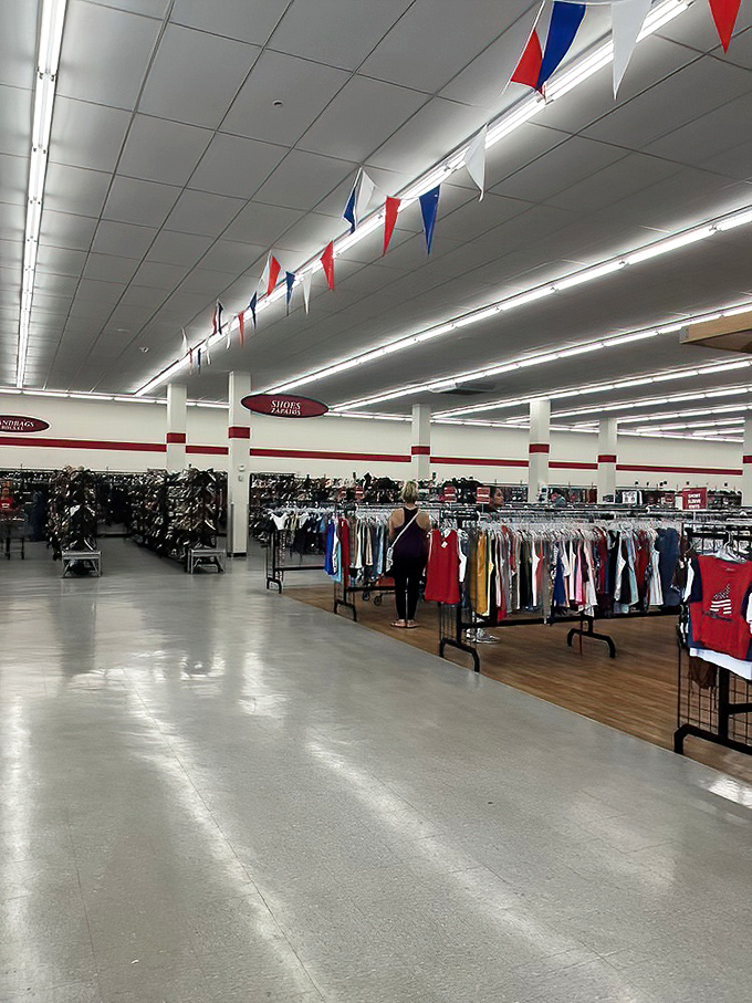 Red, white, and blue bunting adds a festive touch to this section, where patriotic shoppers hunt for deals with the determination of bargain revolutionaries.