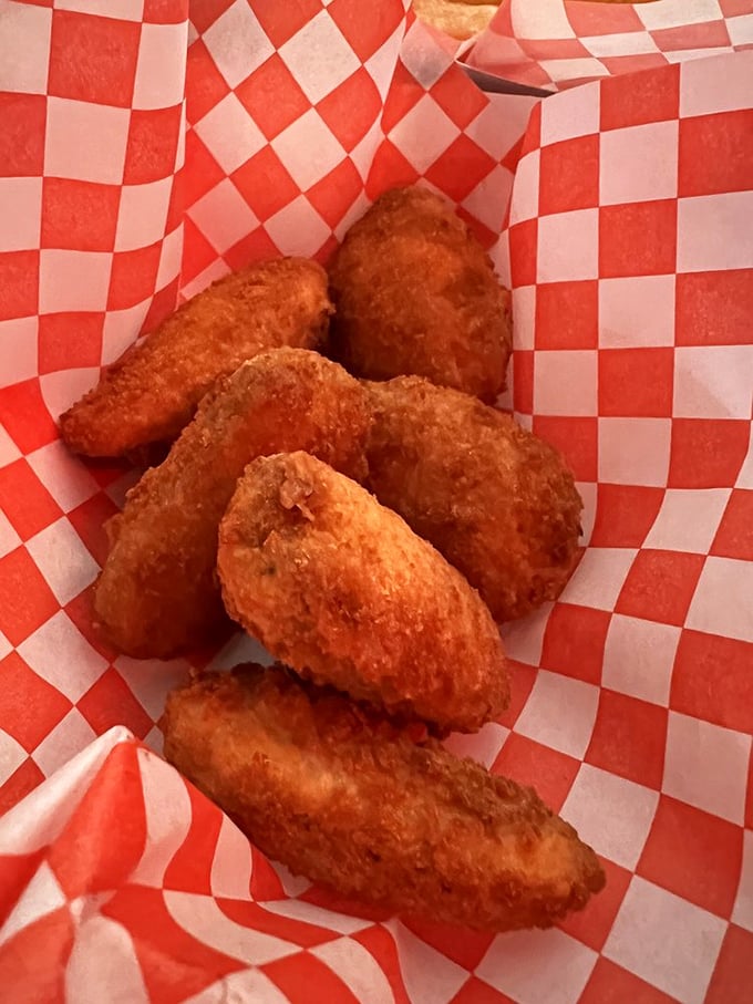 These aren't just jalapeño poppers—they're golden orbs of crispy, creamy, spicy joy that make your taste buds stand up and salute.