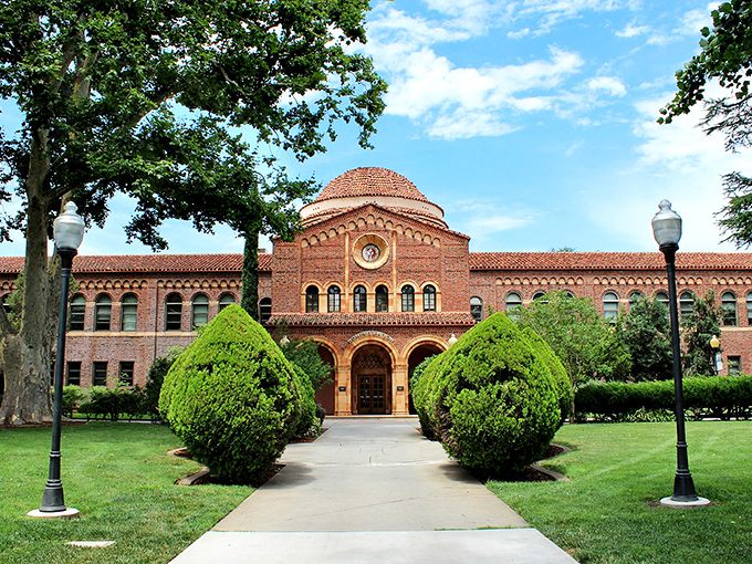Kendall Hall's stately presence anchors the campus with academic gravitas, its dome watching over generations of students who entered nervous and graduated confident.