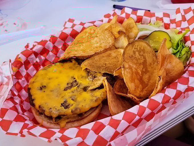 This isn't just a cheeseburger—it's a masterclass in melted perfection. The cheese blankets the patty like a warm, yellow comforter.
