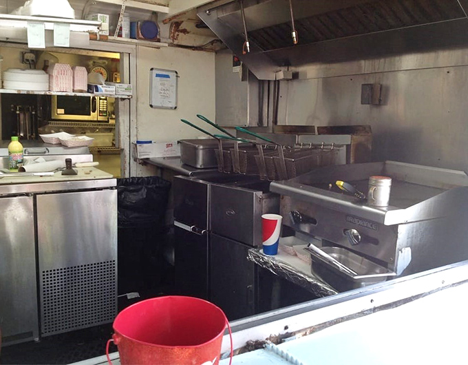 Behind the scenes, a spotless kitchen where the magic happens. Simple equipment producing extraordinary flavors &ndash; proof that great food doesn't require fancy gadgets.
