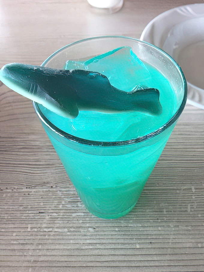 The blue drink that launched a thousand Instagram posts&mdash;complete with shark garnish that's more charming than threatening.