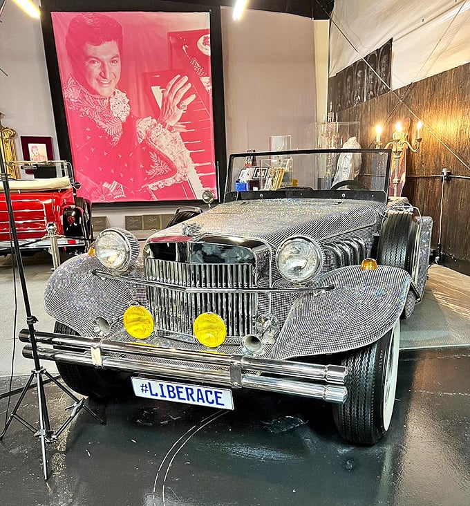 Liberace's rhinestone-studded car sparkles under the lights, a four-wheeled extension of the showman's "too much of a good thing is wonderful" philosophy.